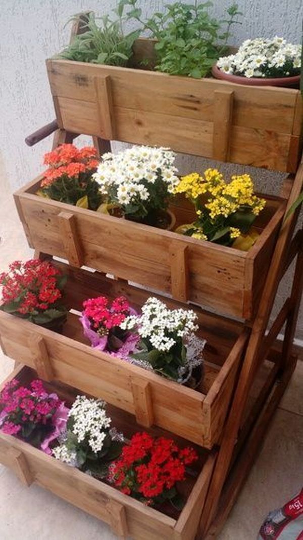 Decoration with DIY wooden pots and flower boxes that giving the garden ...
