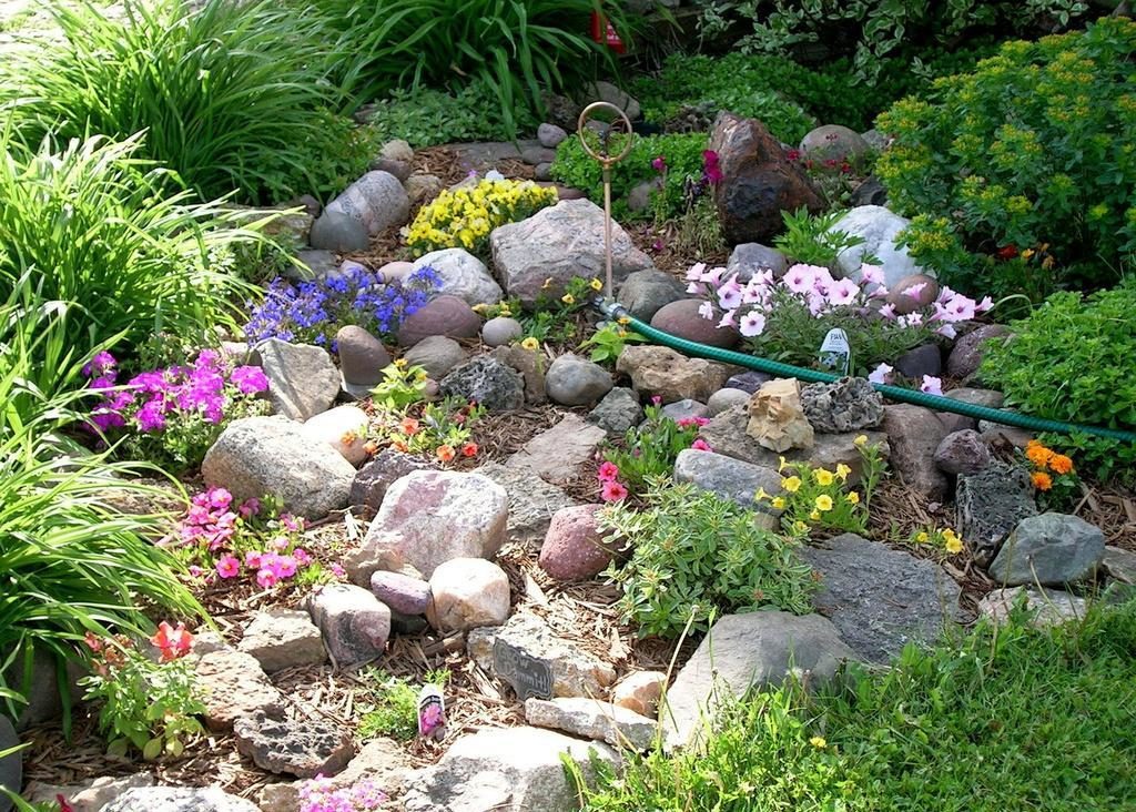 50 DIY Stone flower beds and rock gardens that will boost your garden ...